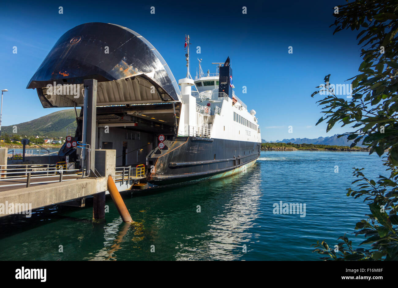 Ferry docking with front lifting, crossing fjord, Arctic Norway ...