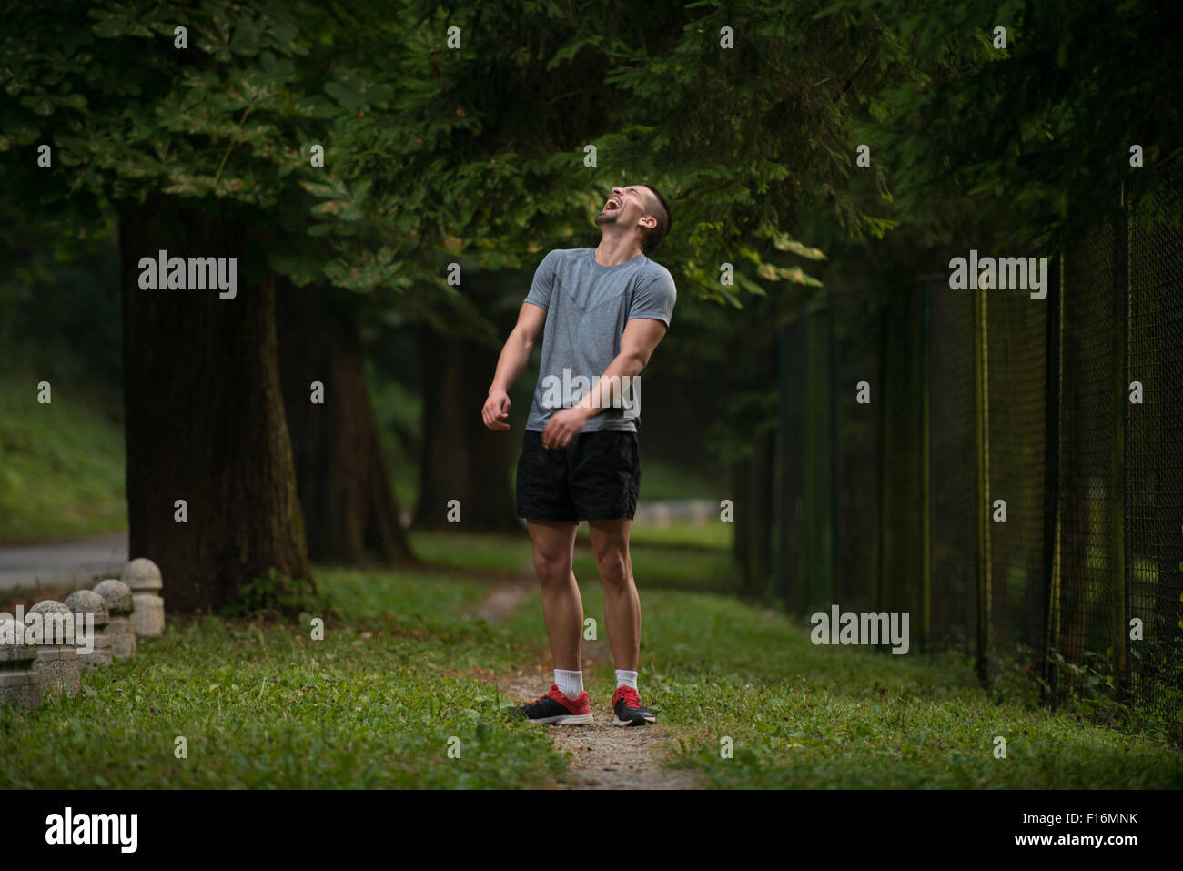 Portrait Of Young Man Doing Outdoor Activity Running - Laughing Stock ...