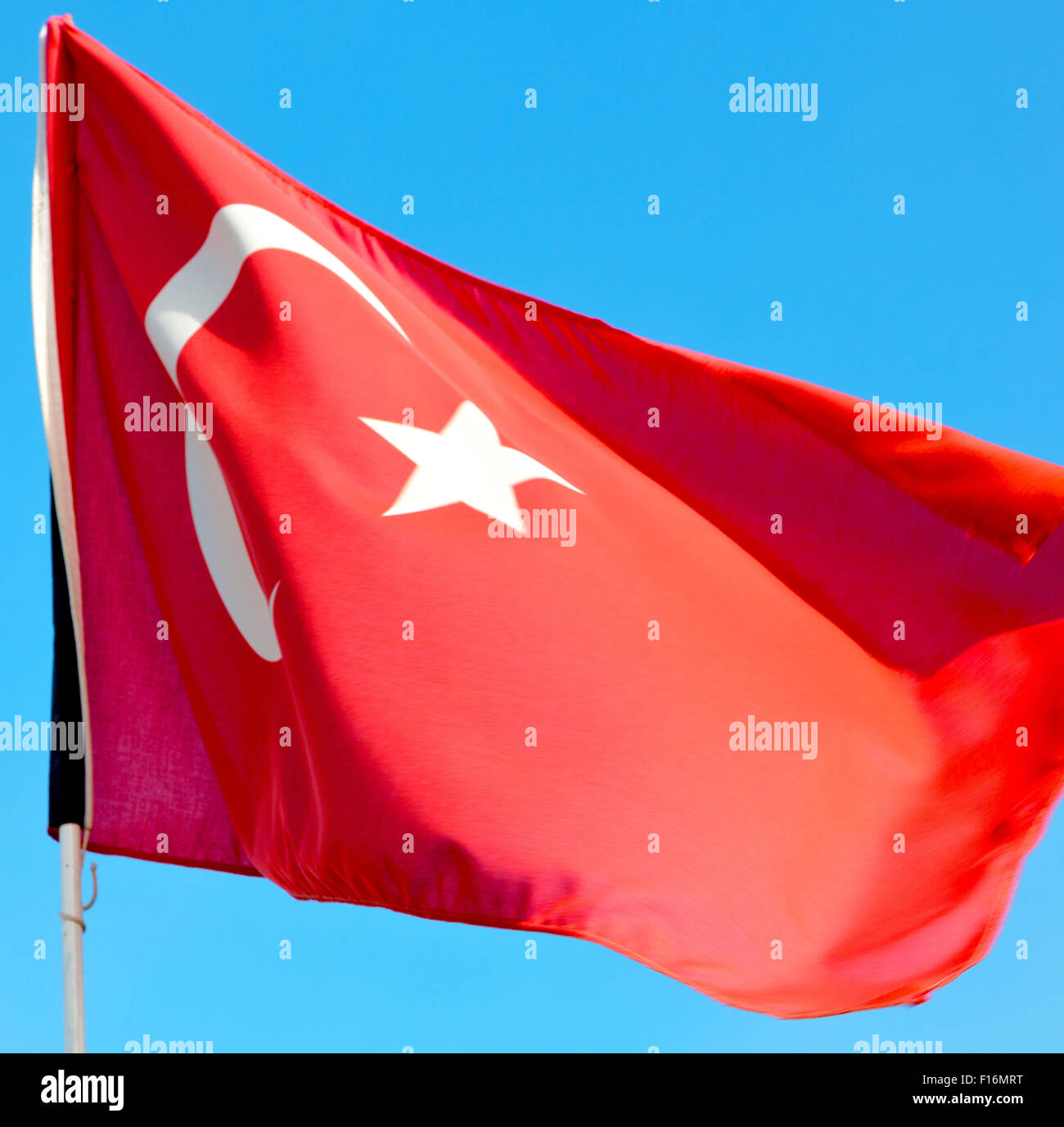 waving flag in the blue sky tunisia colour and wave Stock Photo - Alamy