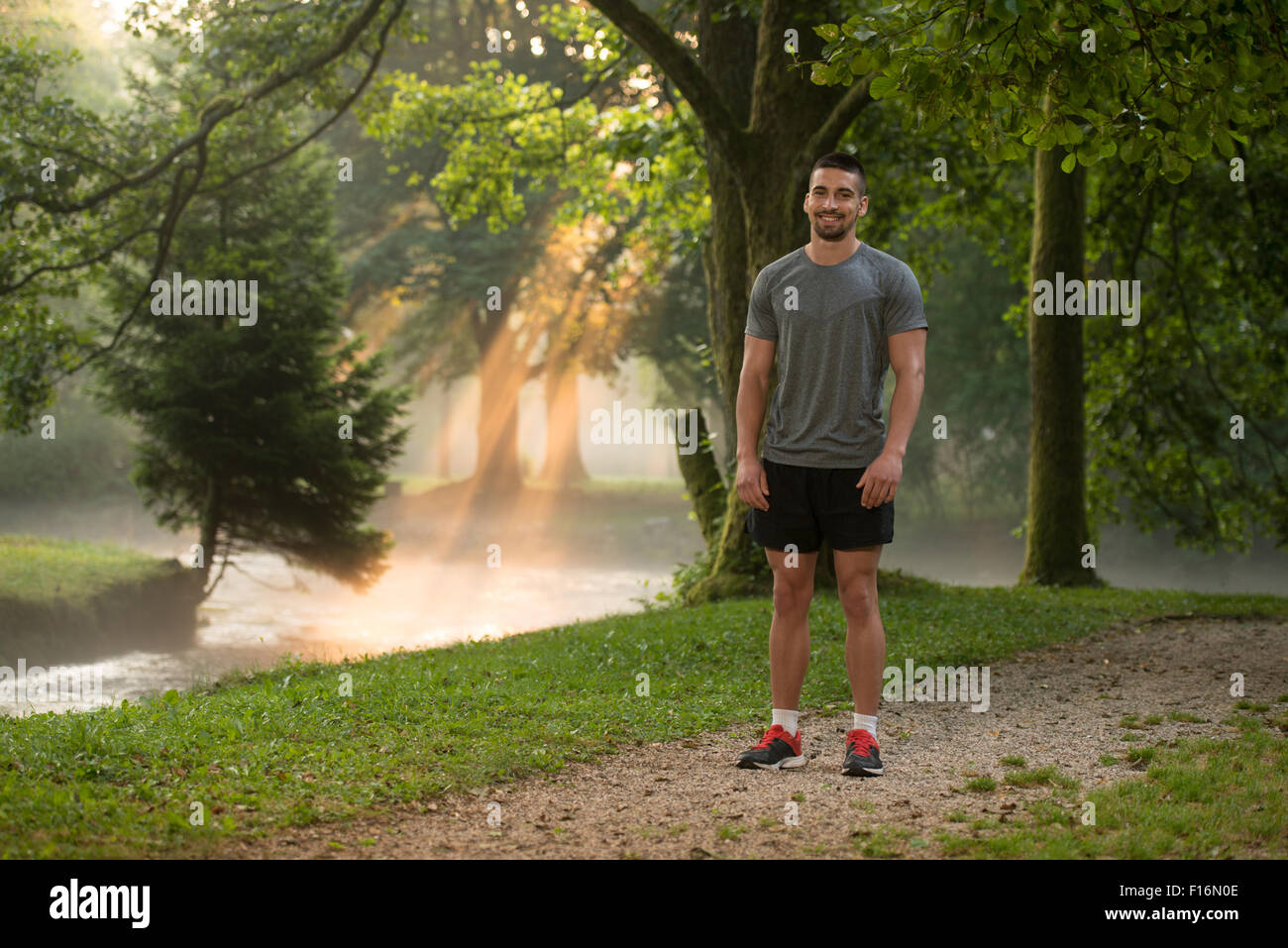 Portrait Of Young Man Doing Outdoor Activity Running Stock Photo - Alamy