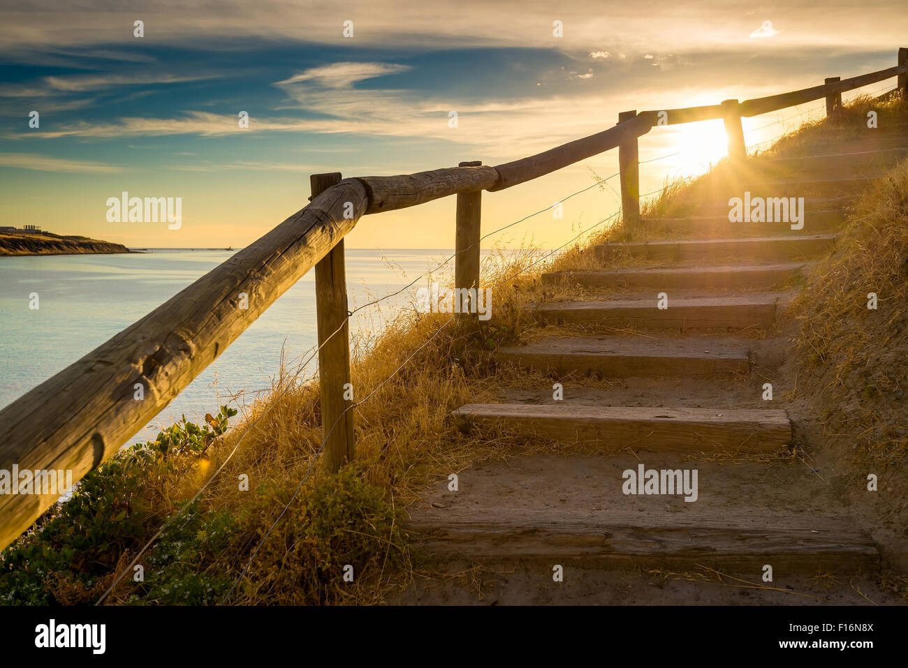 Stairs up on the hill with sunset flares Stock Photo - Alamy
