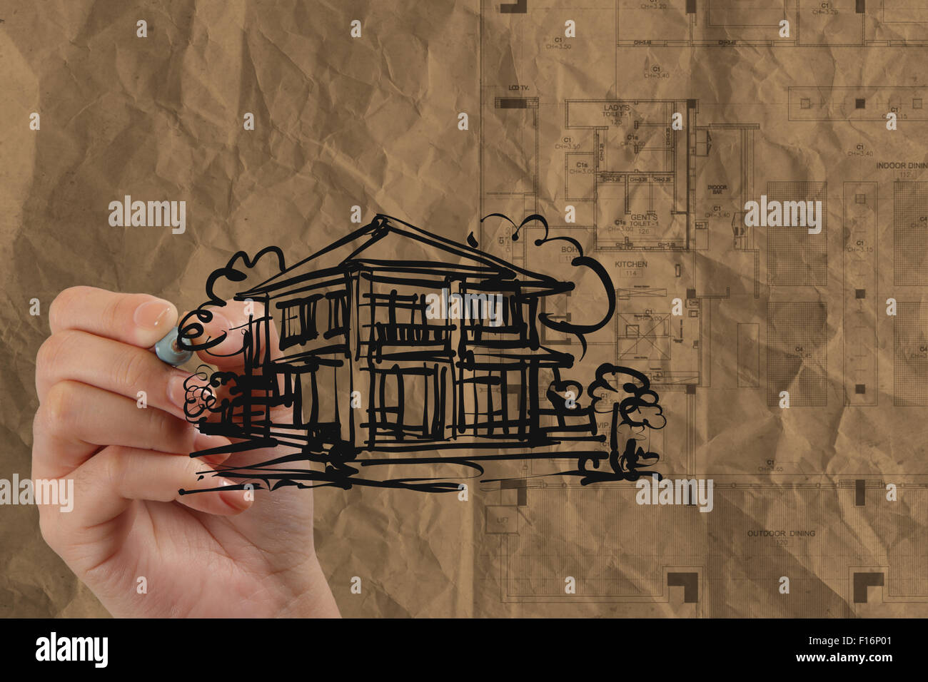 hand drawing house with wrinkled recycle paper as concept Stock Photo ...