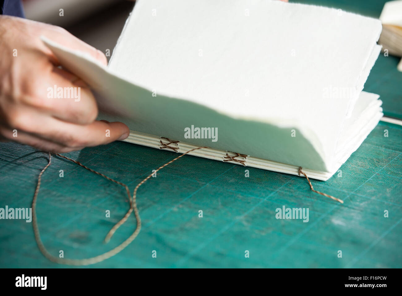 Bookbinding process hi-res stock photography and images - Alamy