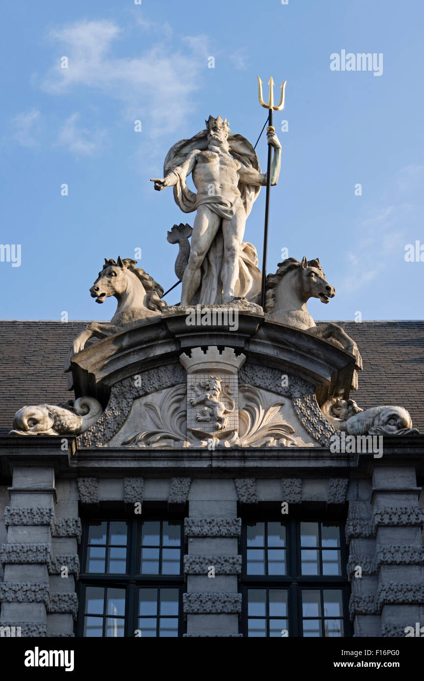 Statue of the Roman god Neptune with trident above the entrance to the ...