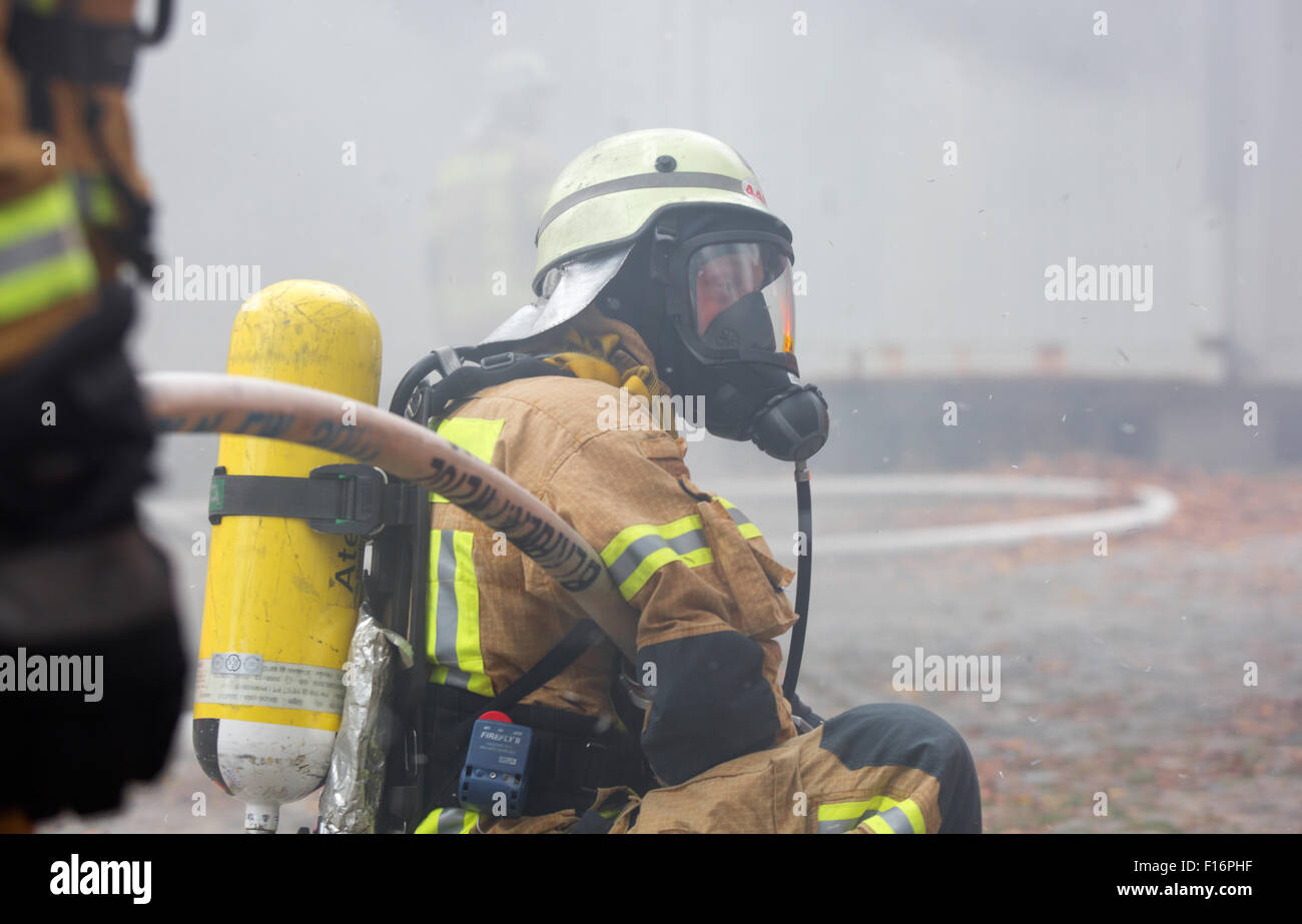 Berlin, Germany, Fireman with breathing protection Stock Photo - Alamy