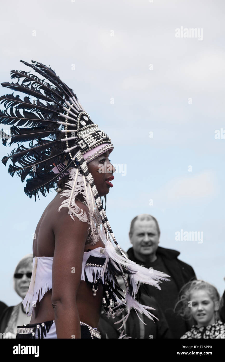Dancer in Red Indian costume at Swanage Carnival Procession in July ...