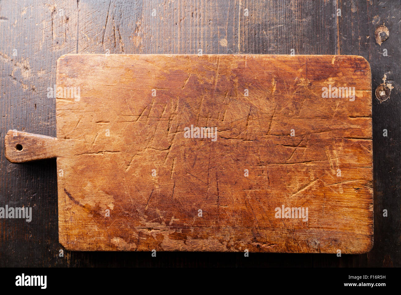 Chopping cutting board on wooden texture background Stock Photo - Alamy