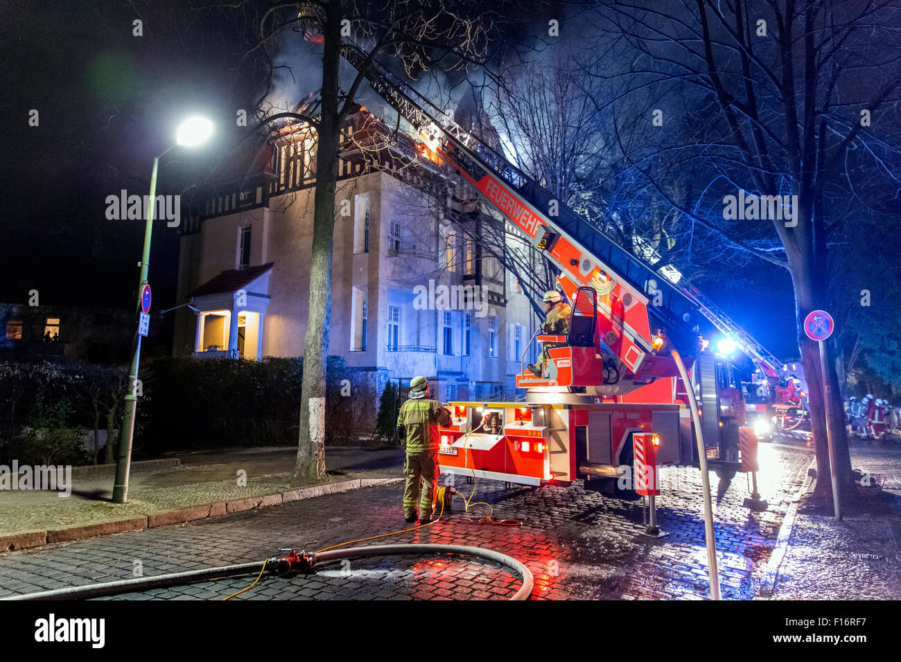 Berlin, Germany, unloading, the fire department with a roof fire Stock ...