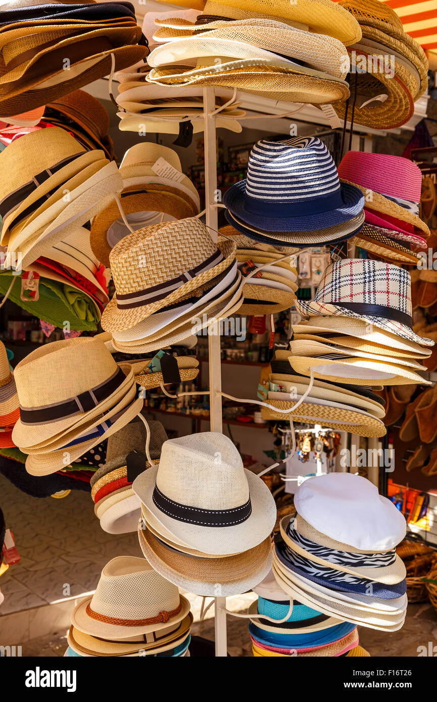 Hats on a hanger hi-res stock photography and images - Alamy