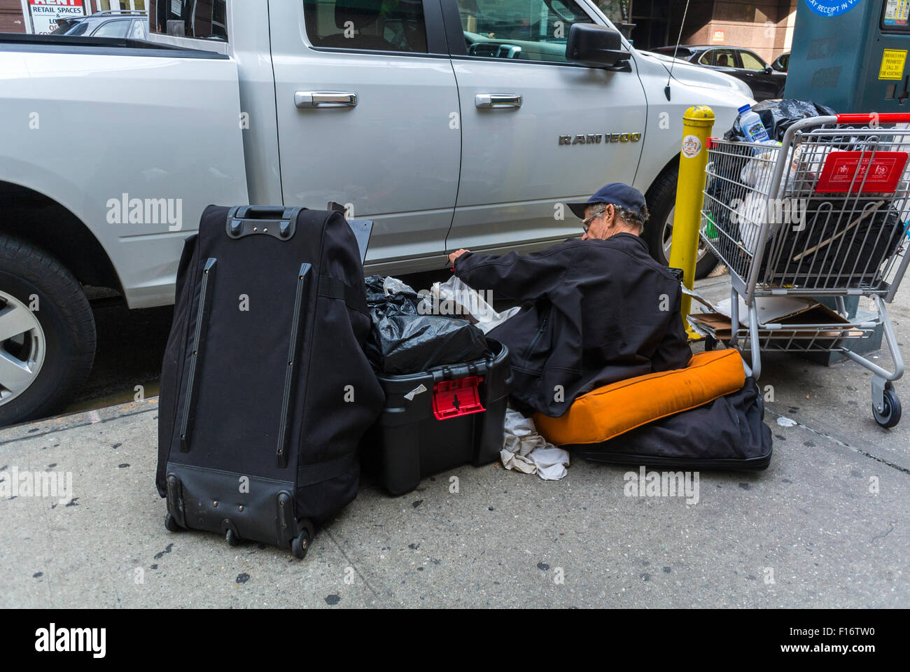 New York City, USA, Street Scenes, Homeless Man Laying on Sidewalk with ...
