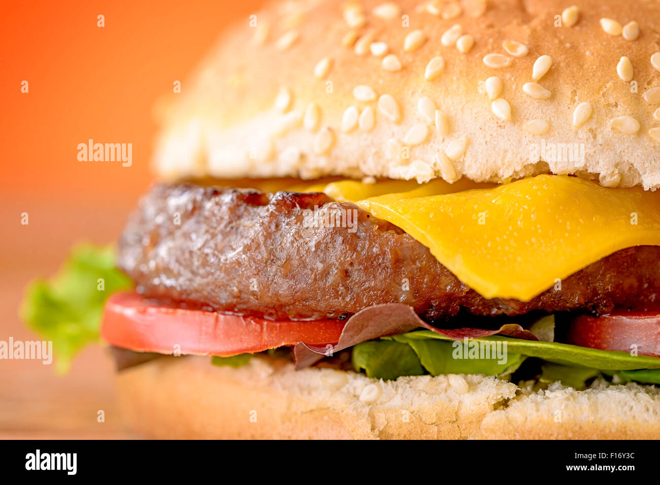 macro cheeseburger, cheddar, burger, salad and tomato Stock Photo - Alamy