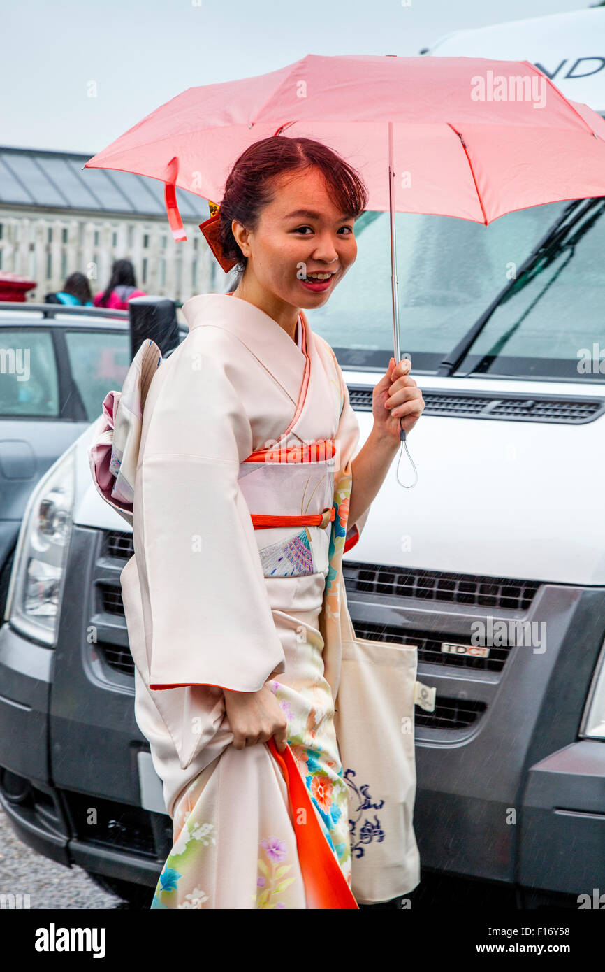 An Opera Fan In A Kimono Arrives In The Pouring Rain At Lewes Station ...