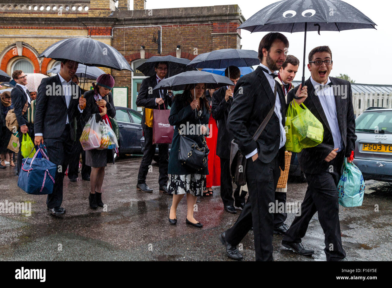 Young Opera Fans Arrive In The Pouring Rain At Lewes Station En Route ...