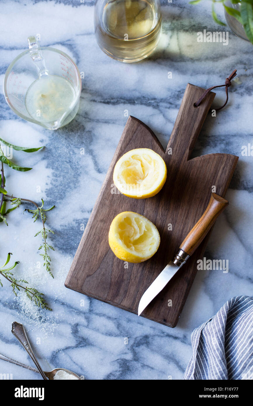 Sliced lemon on a chopping board Stock Photo - Alamy