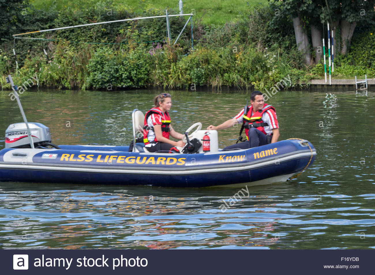 Lifeguards In Inflatable Boat High Resolution Stock Photography and ...