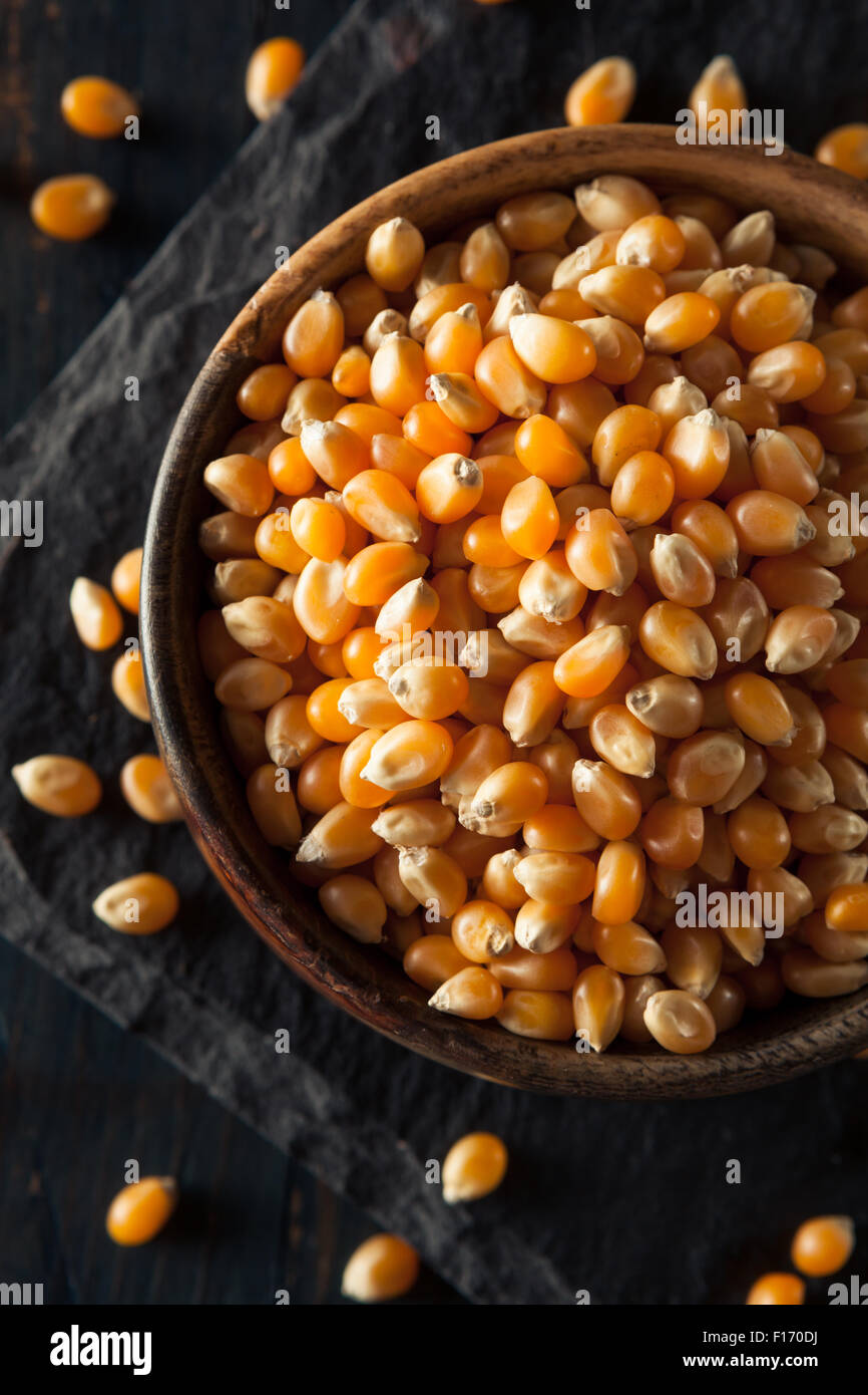 Raw Organic Yellow Popcorn in a Bowl Stock Photo - Alamy