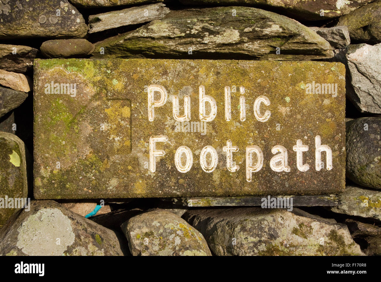 Stone Public Footpath Sign. The stone public footpath sign is embedded ...