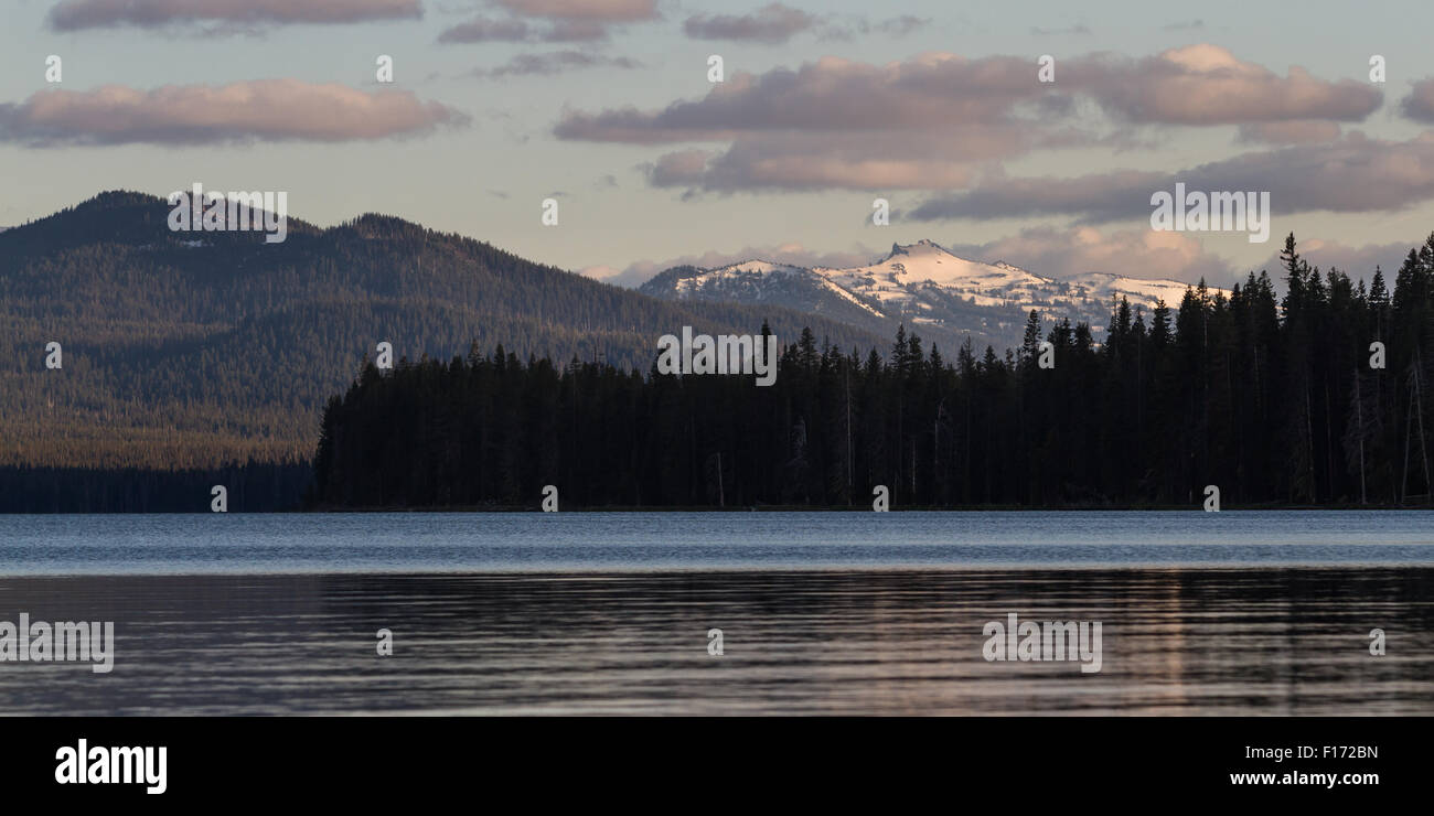 view of Union Peak in Oregon from Diamond Lake as the sun goes down ...