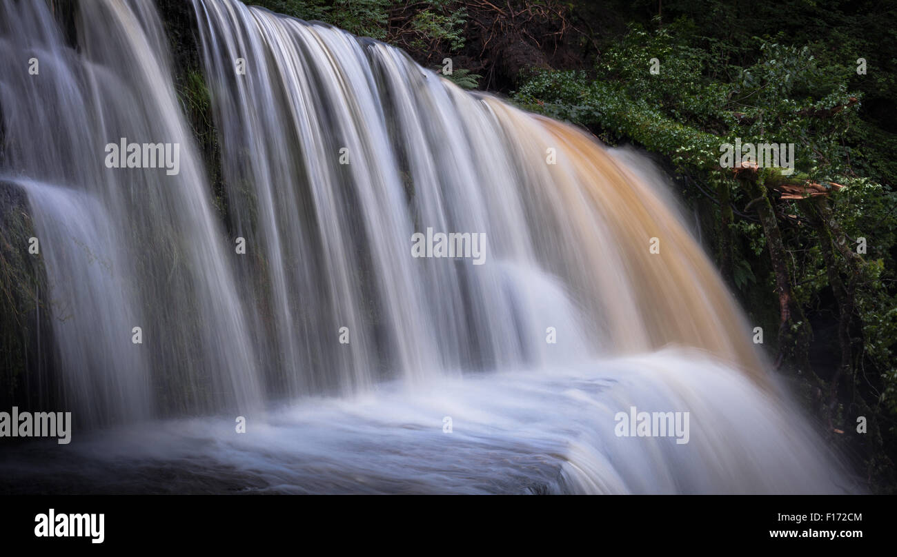 Huge ledged waterfall on the Mellte river, near Pontneddfechan in South ...