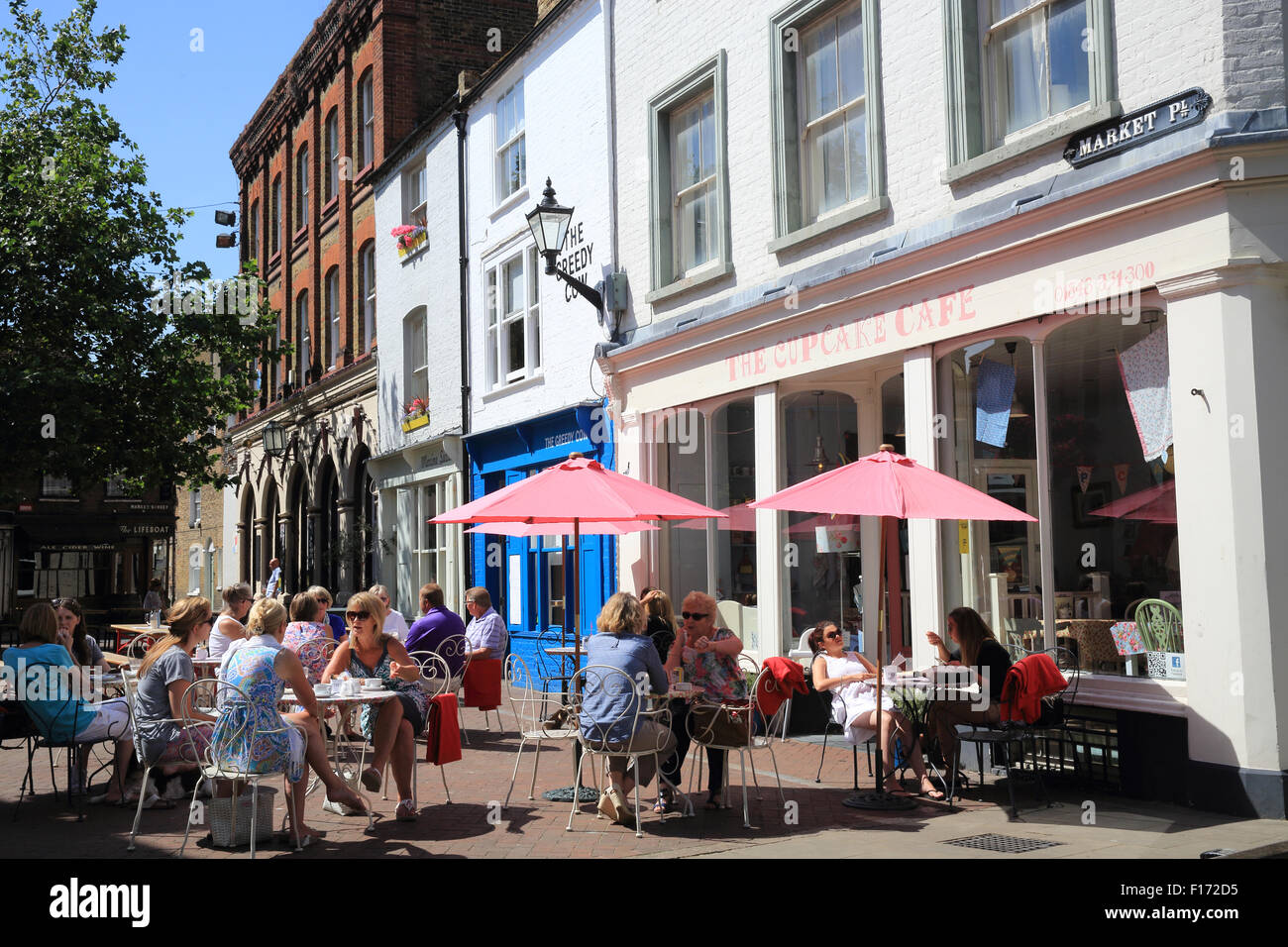 Cafes in Market Place, on a summer's day in the old town in trendy ...