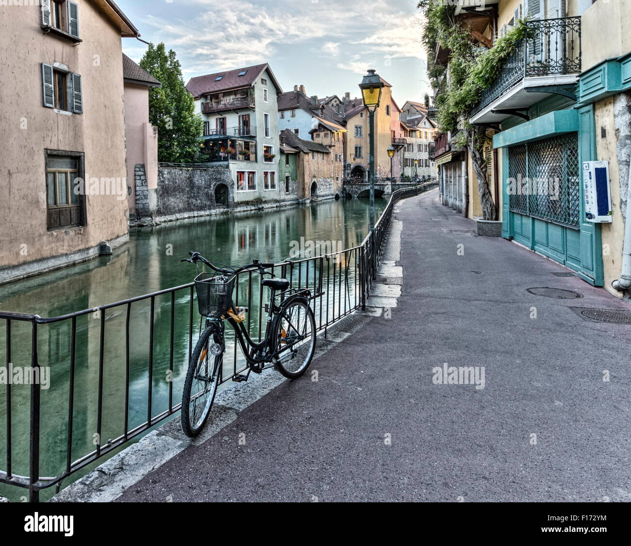 Street in Annecy old city with colorful houses and a bike, France, HDR ...