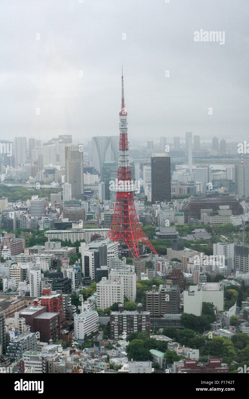 Tokyo tower early morning hazy sky from up high with urban sprawl surrounding Stock Photo - Alamy