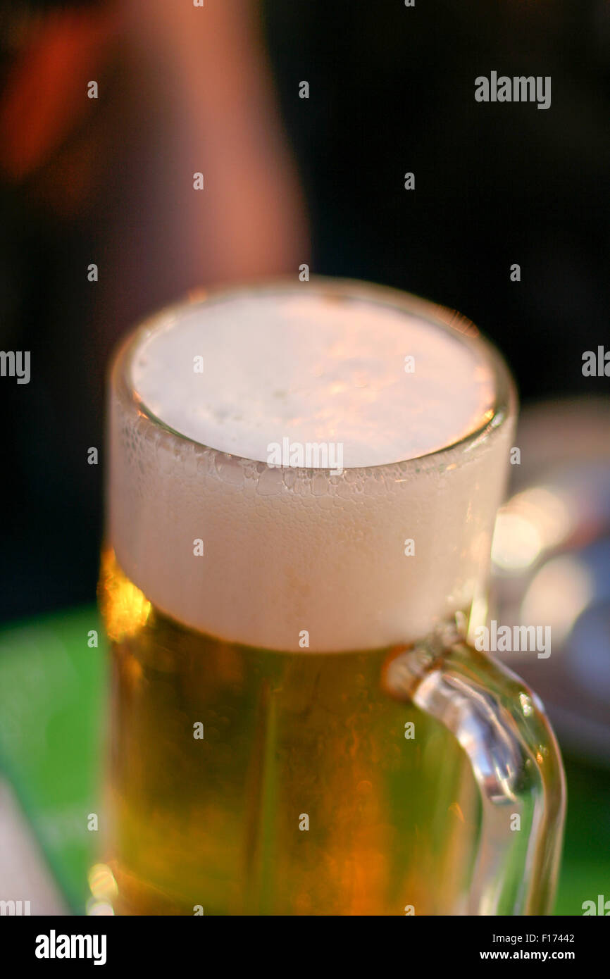 Glass of lager beer with froth foam head depth of field Stock Photo - Alamy