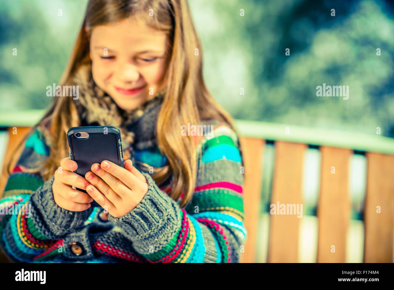 Caucasian Teenage with Smartphone. Girl Playing Cell Phone Stock Photo ...