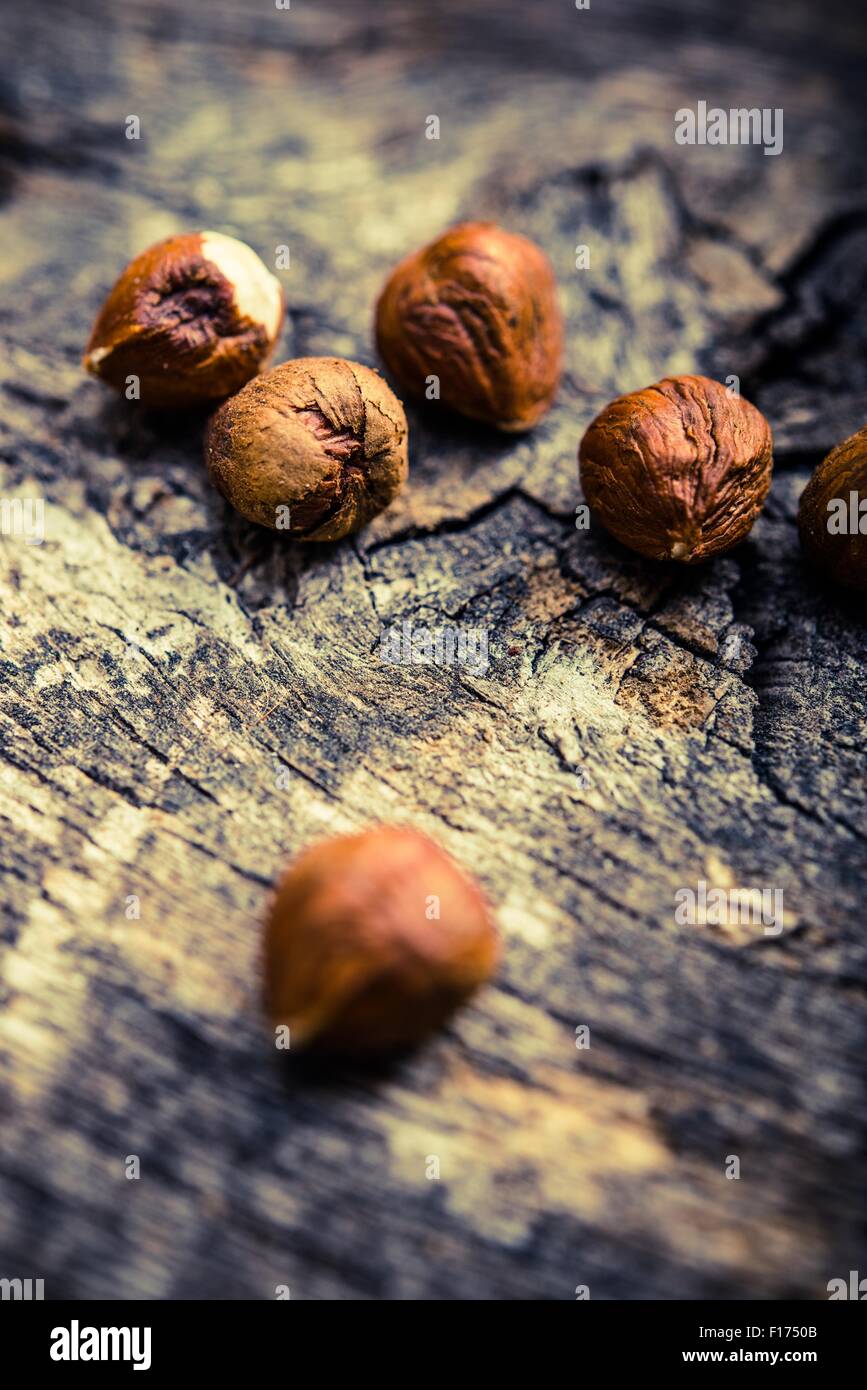 Raw Hazelnuts on Aged Wood Plank Stock Photo - Alamy