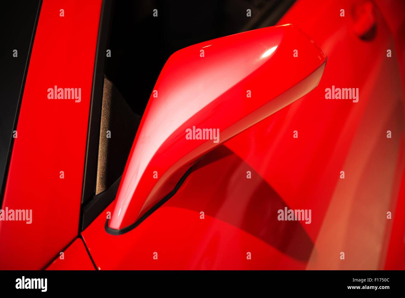 Red Car Mirror Driving Theme. Transportation Concept Stock Photo - Alamy