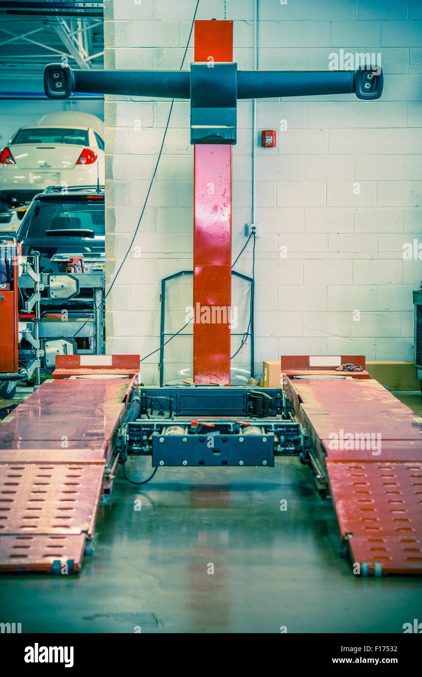 Wheel Alignment Lift in Authorized Car Service. Auto Service Equipment ...