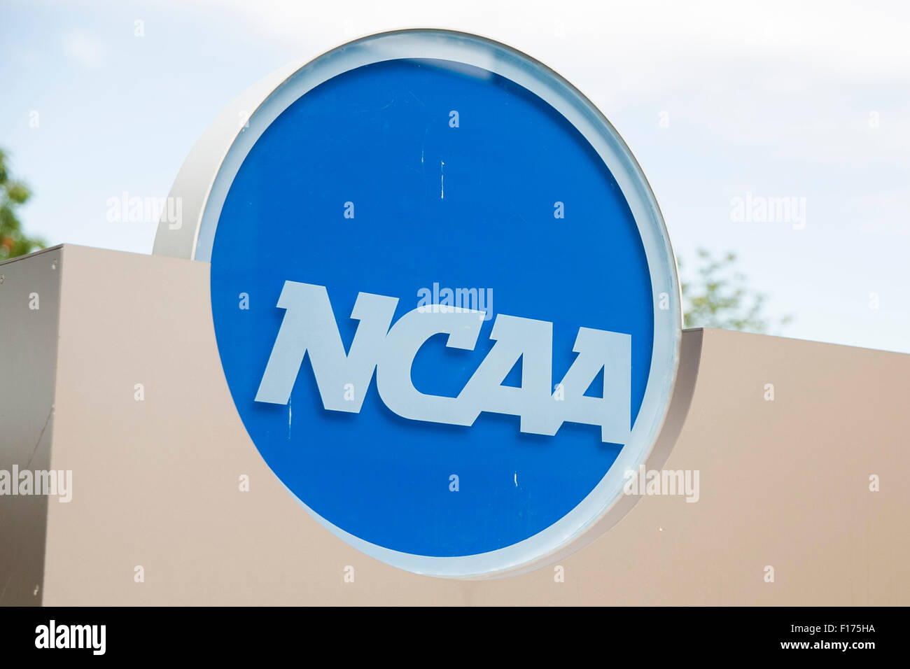 A logo sign outside of the headquarters of the National Collegiate ...