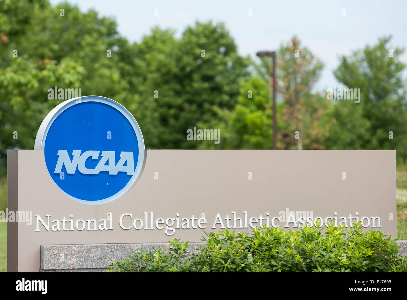 A logo sign outside of the headquarters of the National Collegiate ...