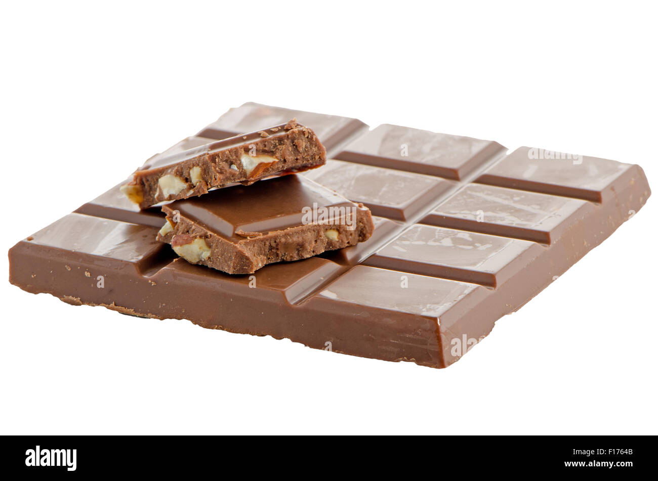 Closeup detail of chocolate parts on white background Stock Photo - Alamy