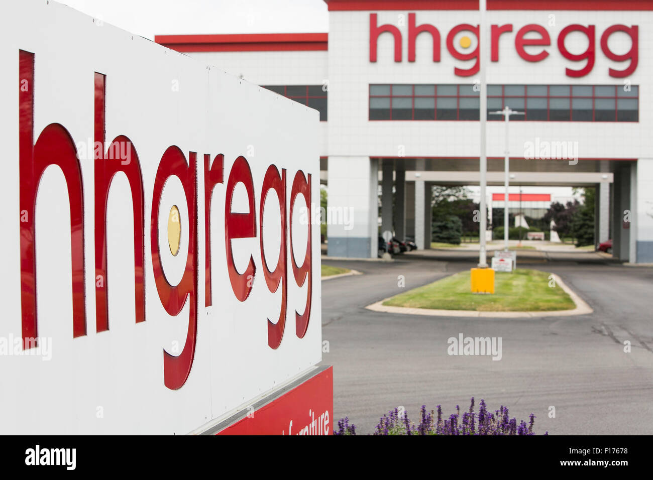 A logo sign outside of the headquarters of hhgregg, Inc., in Indianapolis, Indiana on August 15 ...