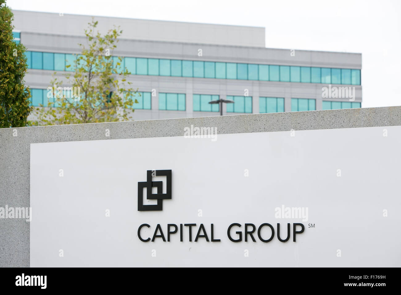 A logo sign outside of a facility occupied by the Capital Group in ...