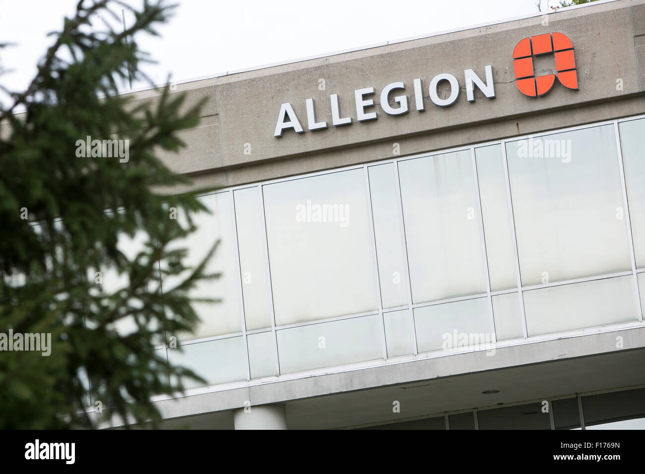 A logo sign outside of the North American Headquarters of Allegion in ...