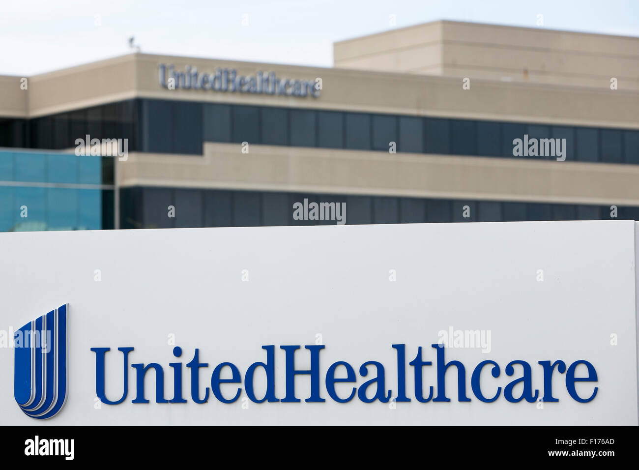 A logo sign outside of a facility occupied by UnitedHealthcare in ...