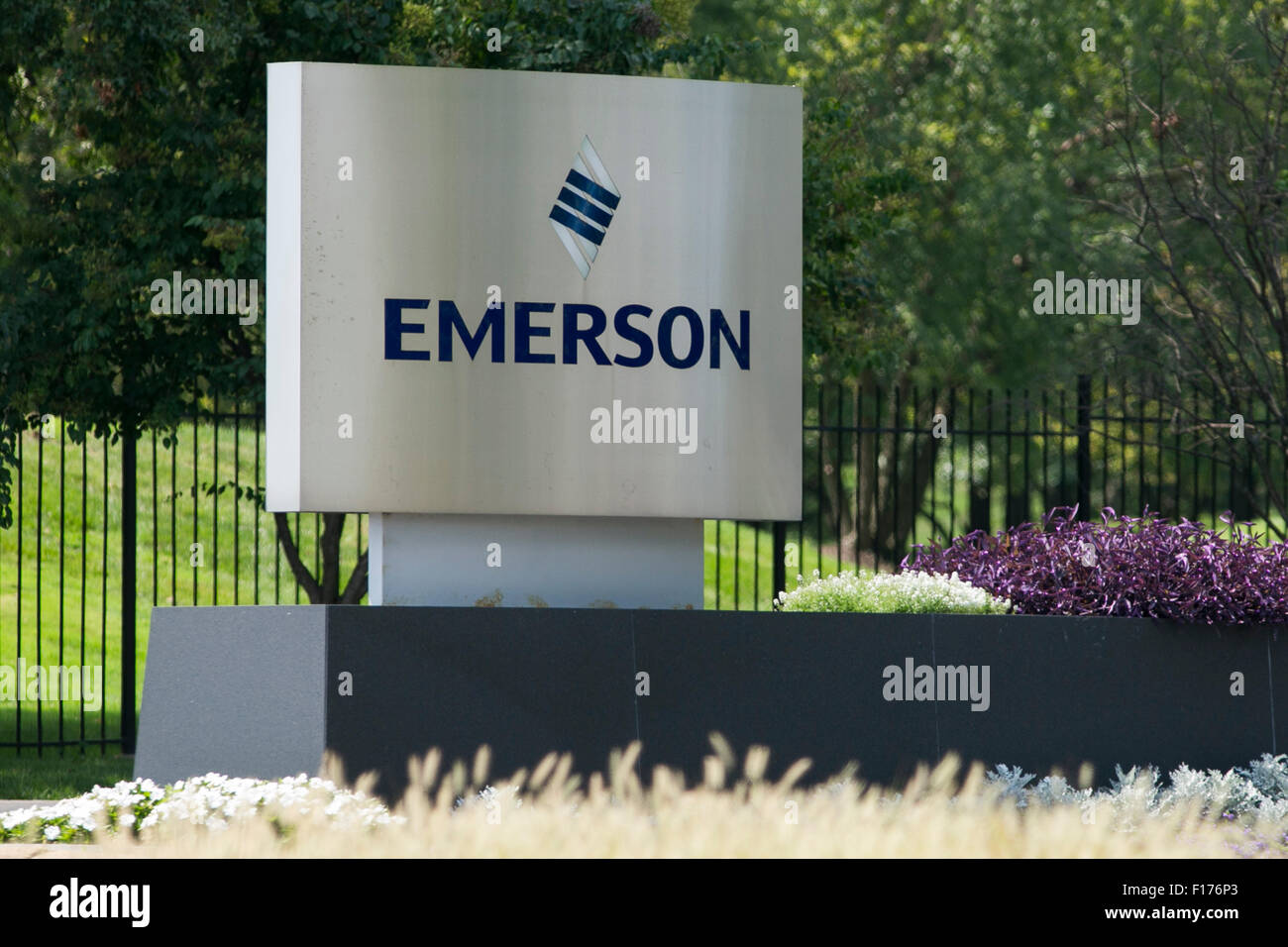 A logo sign outside of the headquarters of Emerson Electric, in ...