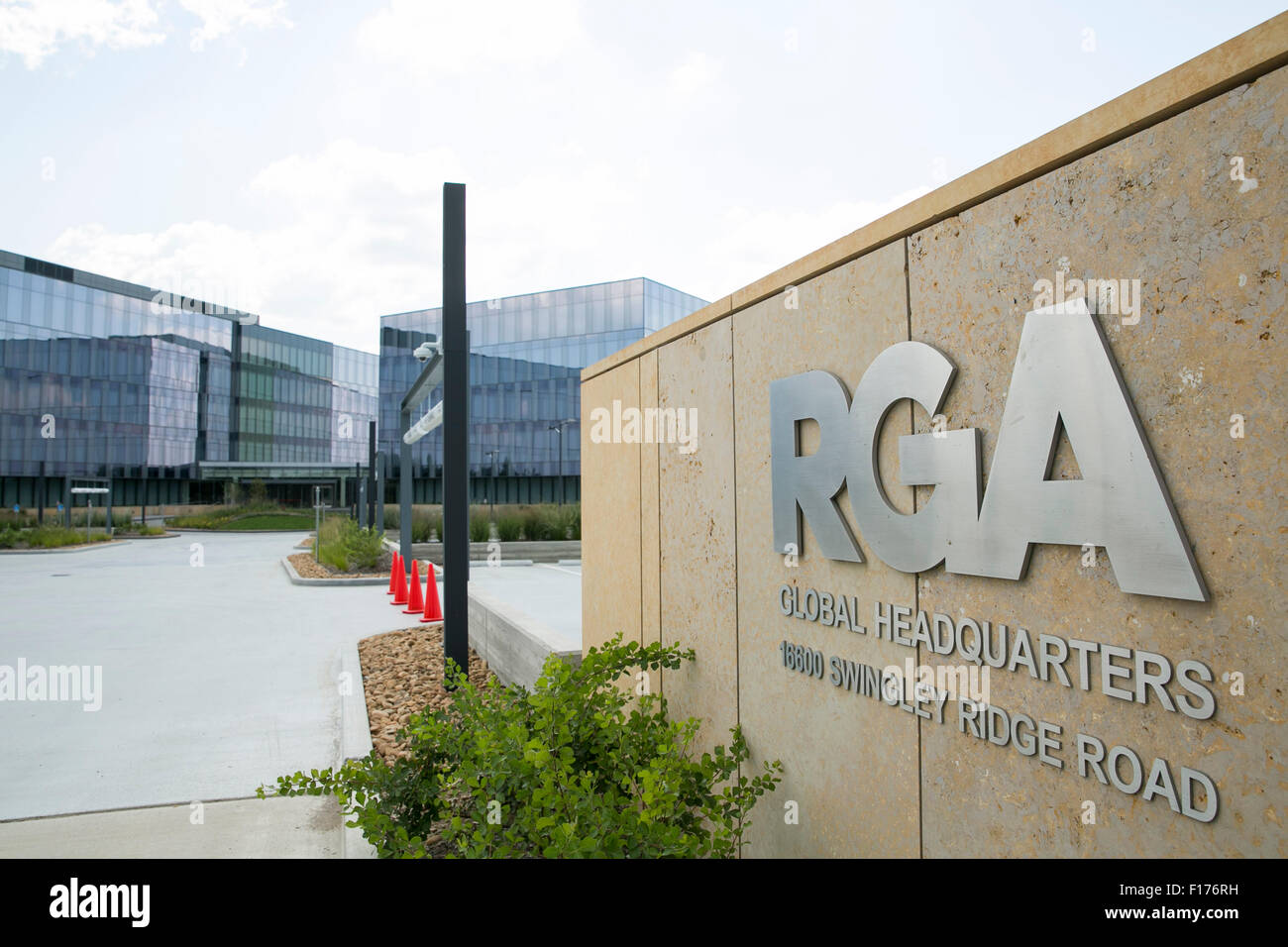 A logo sign outside of the headquarters of Reinsurance Group of America ...