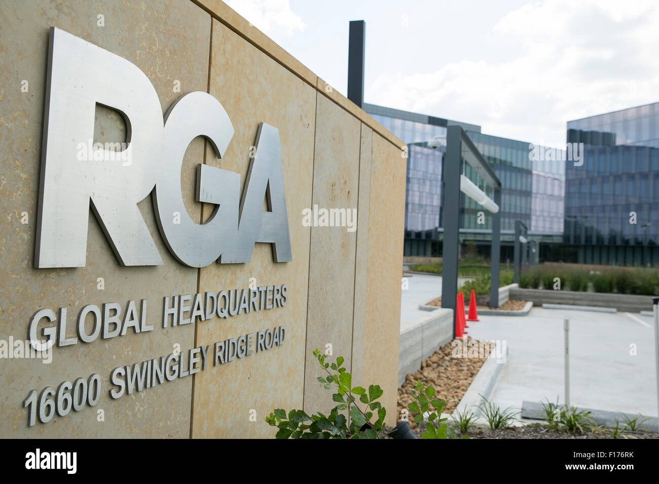 A logo sign outside of the headquarters of Reinsurance Group of America ...