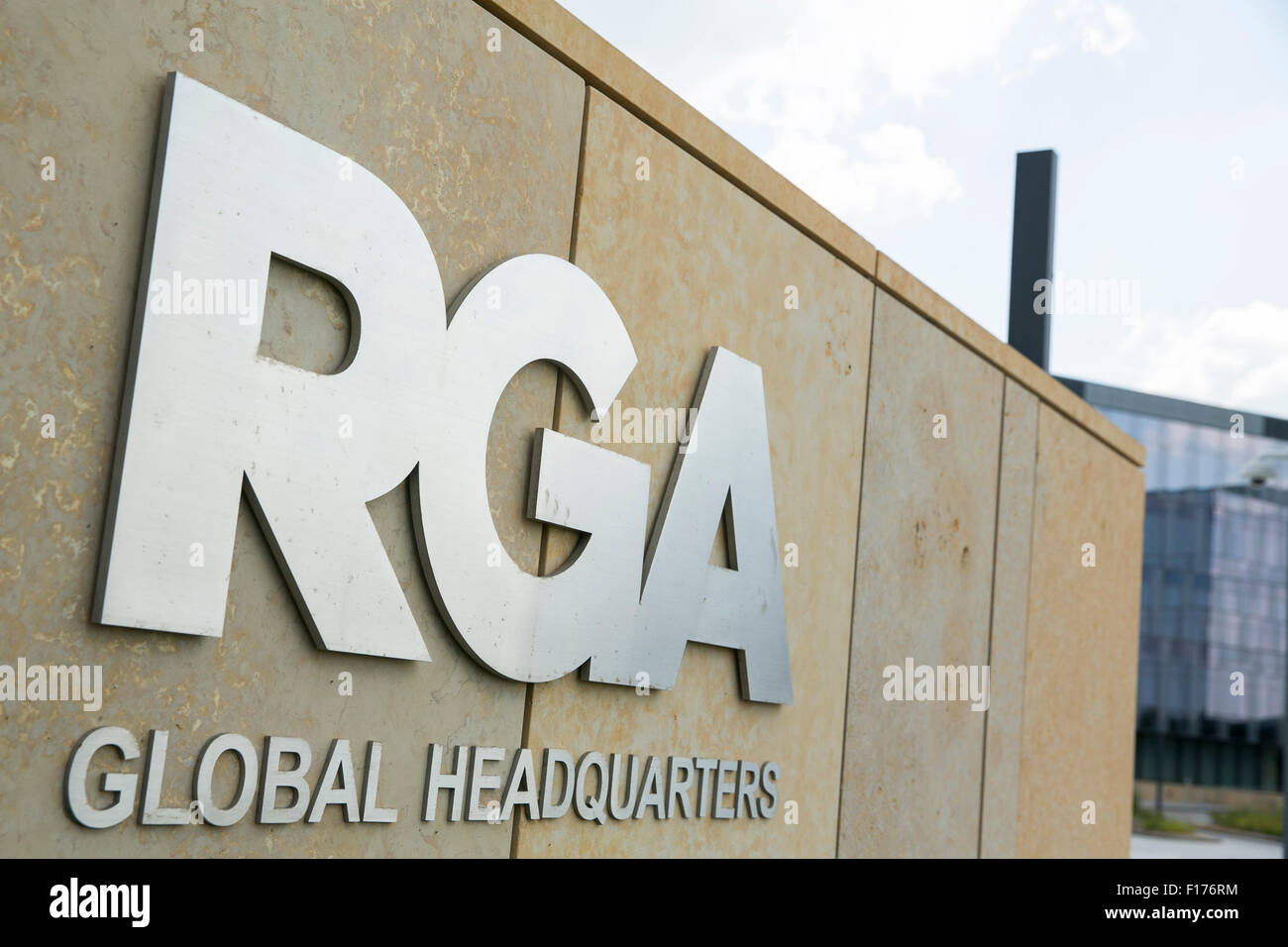 A logo sign outside of the headquarters of Reinsurance Group of America ...