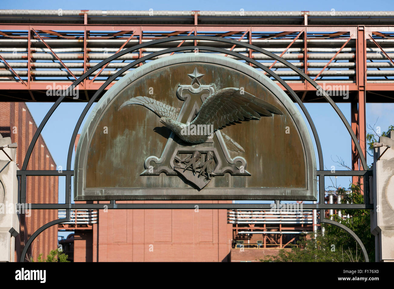 A logo sign outside of the headquarters of the Anheuser-Busch Companies ...