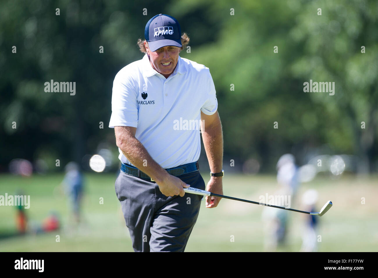 Edison, NJ, USA. 28th Aug, 2015. Phil Mickelson (USA) reacts with ...