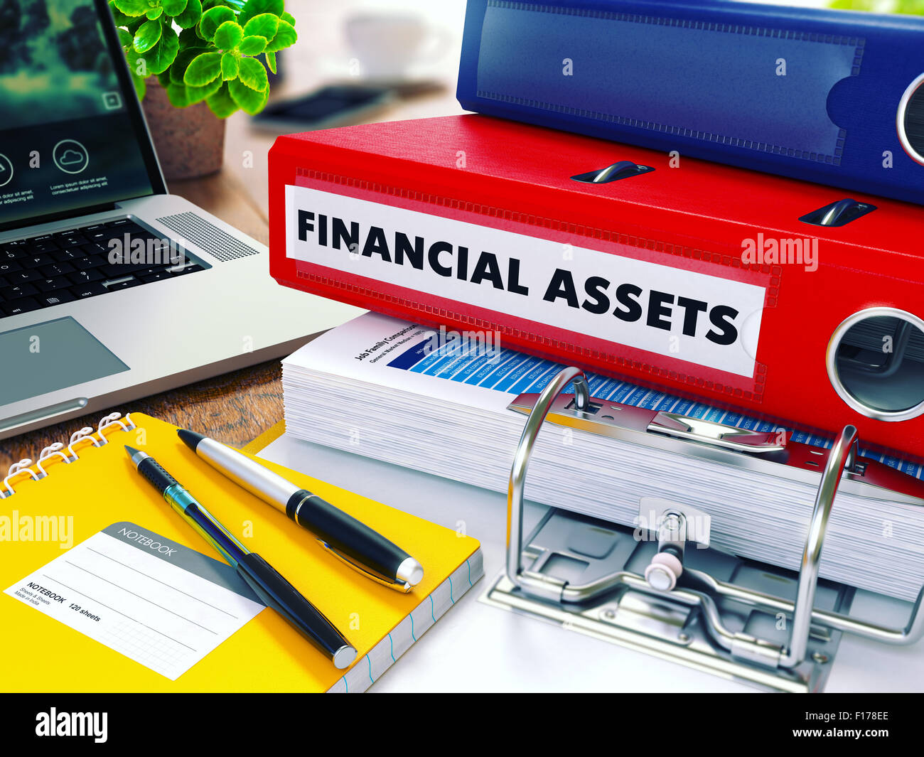 Financial Assets - Red Ring Binder on Office Desktop with Office ...