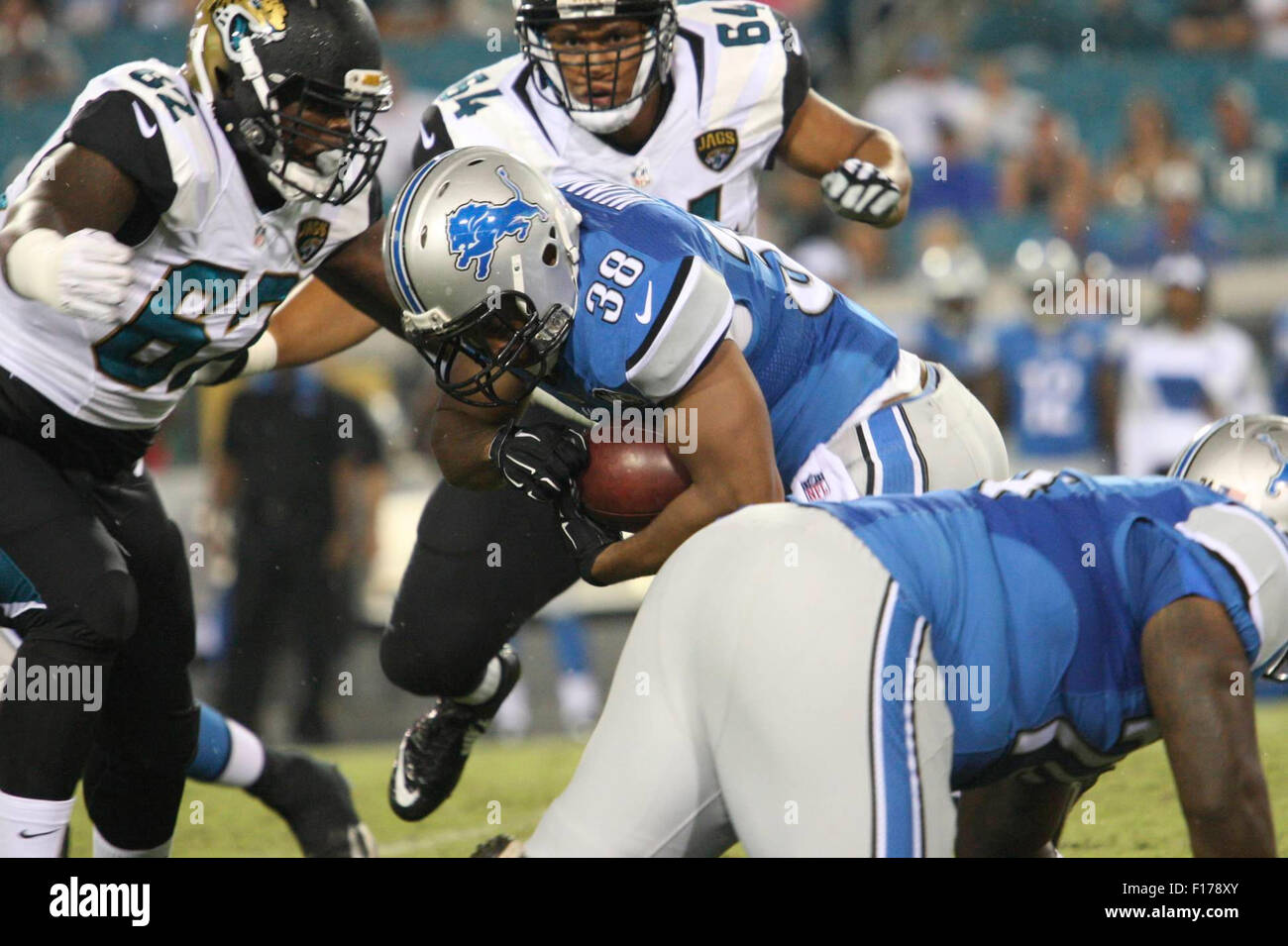Jacksonville, FL, USA. 28th Aug, 2015. RB George Winn (38) runs with ...