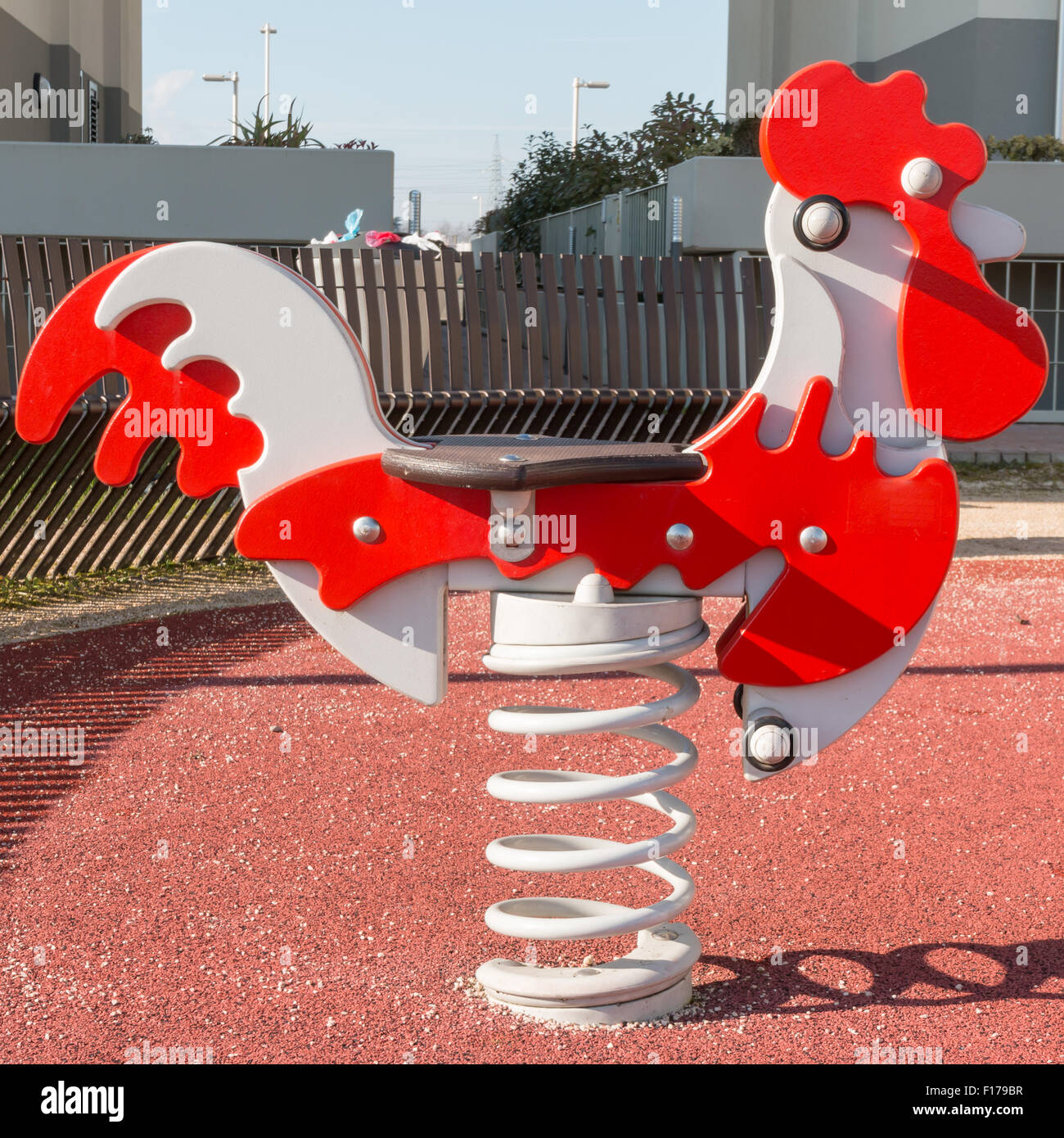 Bouncy colorful spring playground equipment in public park, plastic ...