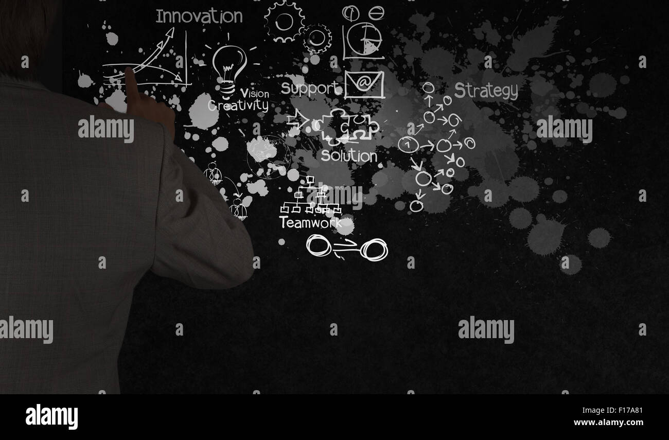 businessman hand drawing business strategy and color splash as concept ...