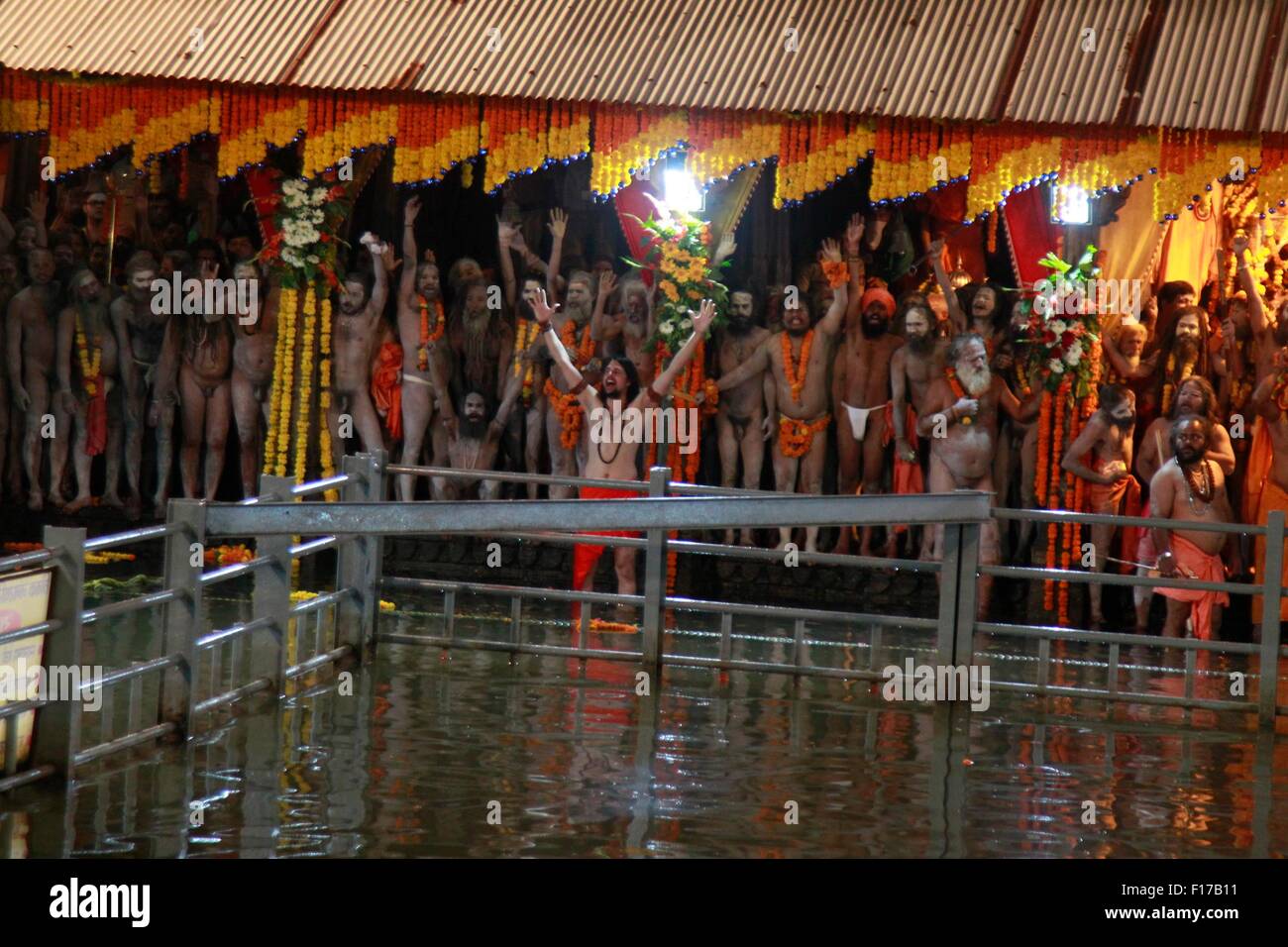 Naga sadhu bath hi-res stock photography and images - Alamy