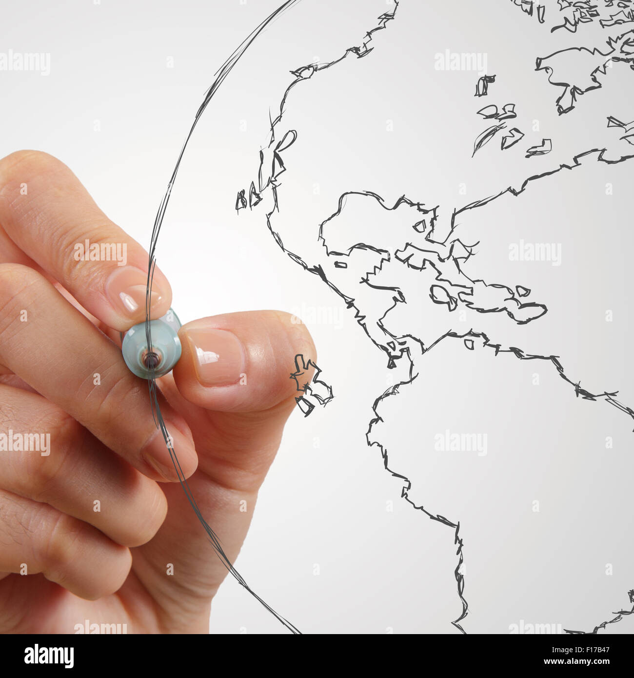 female hand drawing earth as concept Stock Photo - Alamy